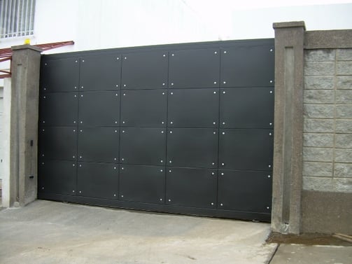 Portón a base de Duelas